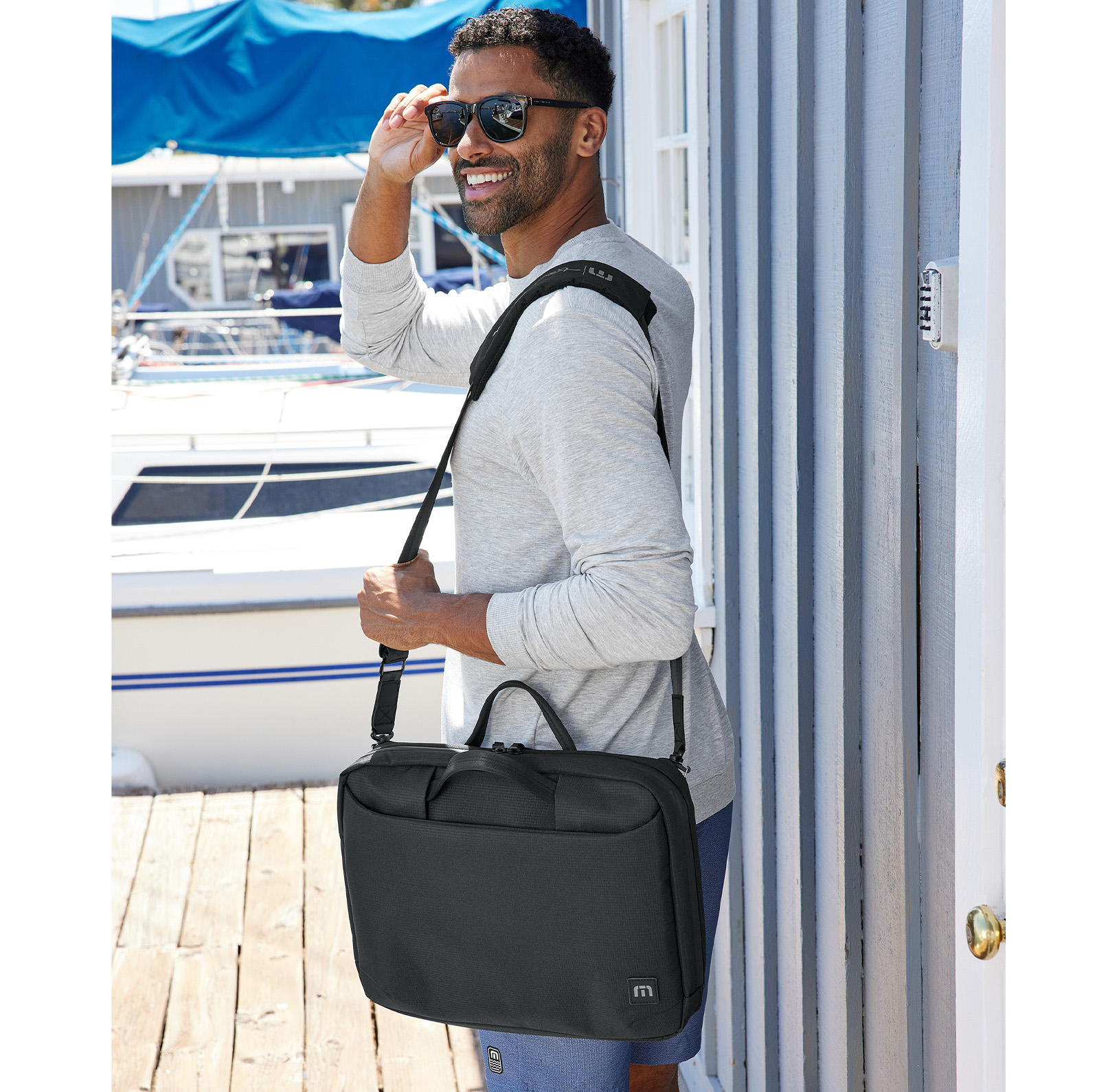 TravisMathew Lateral Brief Bag - Custom Branded Promotional Bags - Swag.com